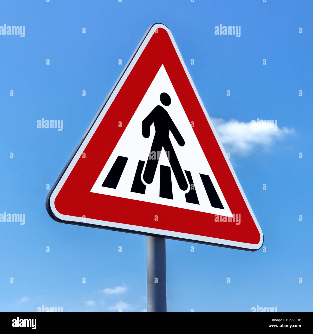 Warning sign with crosswalk symbol Stock Photo - Alamy