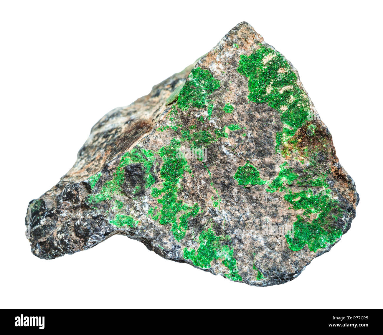 Uvarovite crystals on raw Chromite stone isolated Stock Photo - Alamy