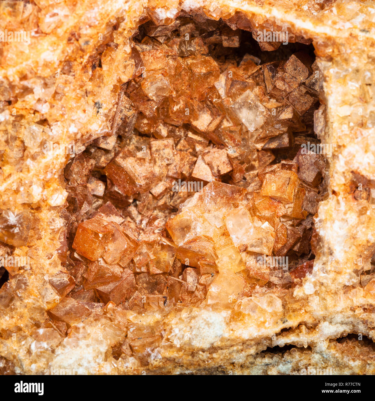 Wulfenite crystals in geode close up Stock Photo - Alamy