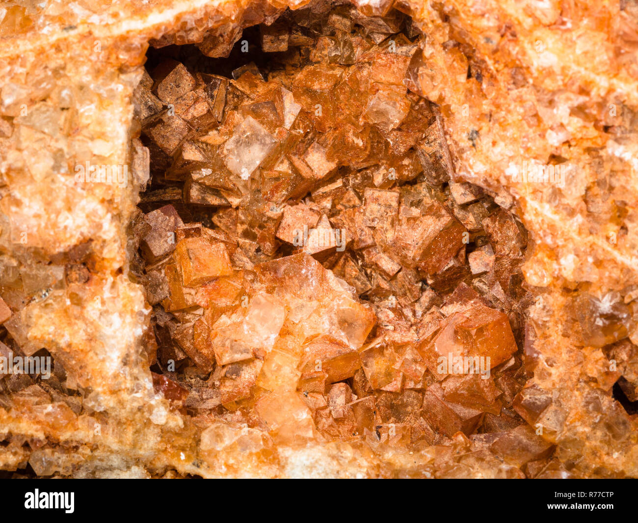 Wulfenite crystals in vug close up Stock Photo - Alamy