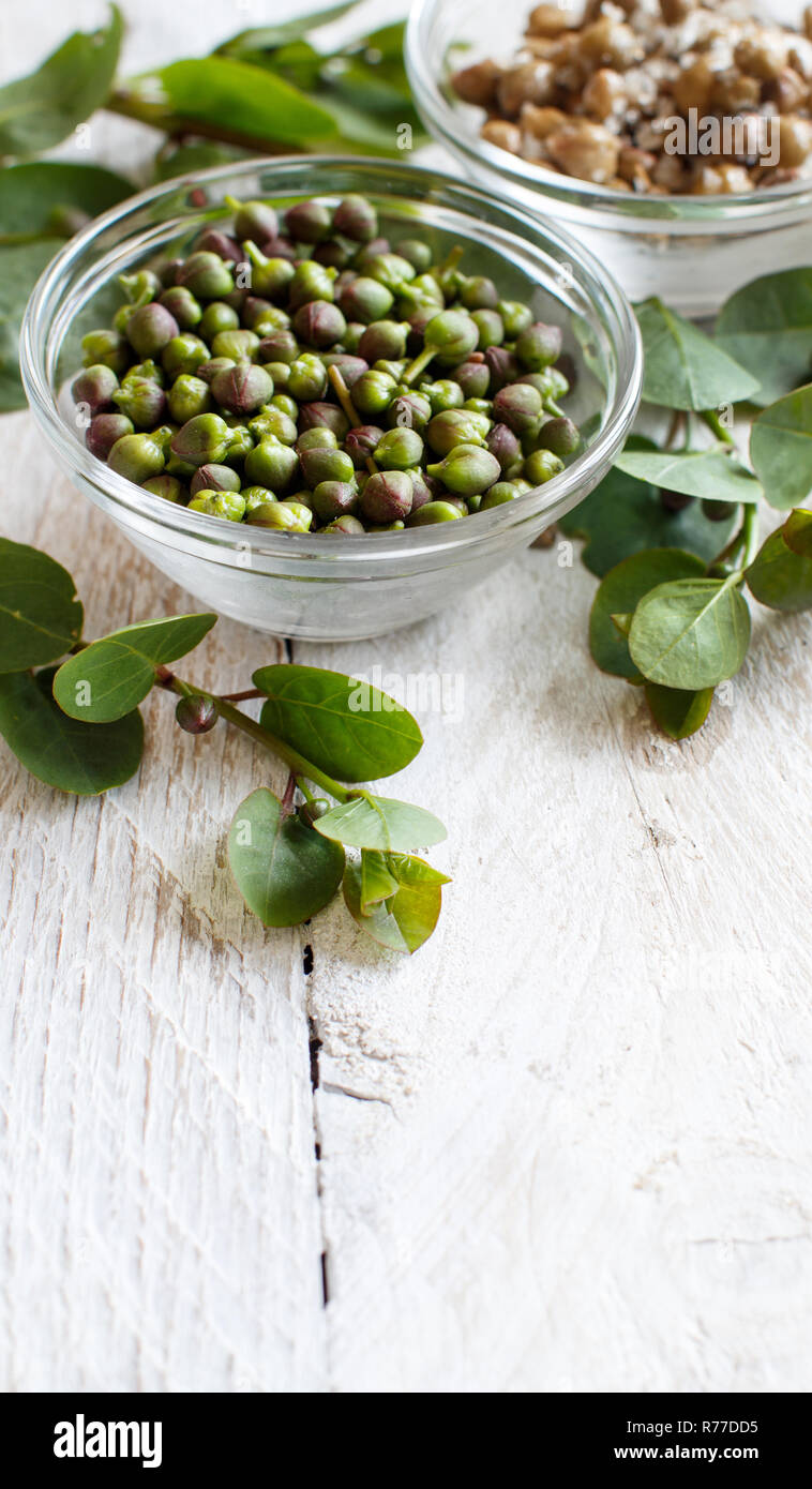 Fresh and salted capers Stock Photo - Alamy