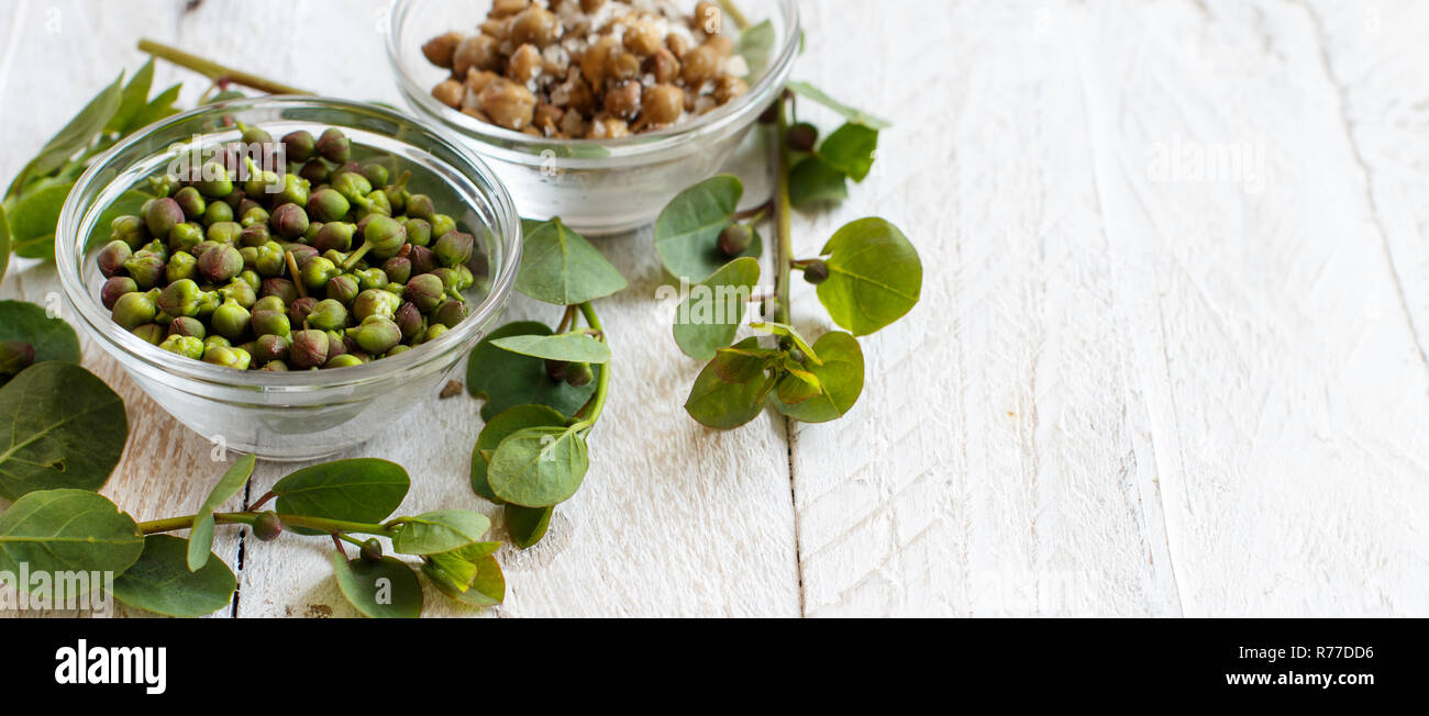 Fresh and salted capers Stock Photo - Alamy