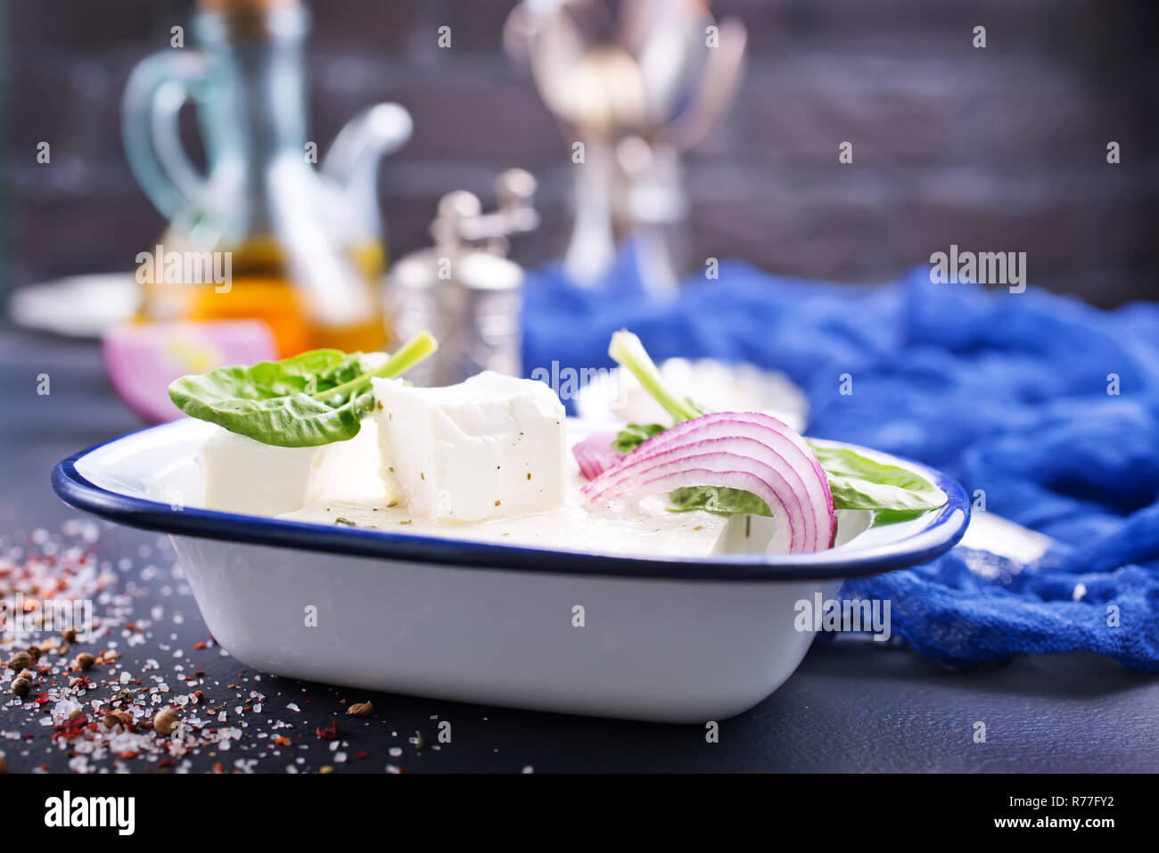 feta cheese in metal bowl on a table Stock Photo - Alamy