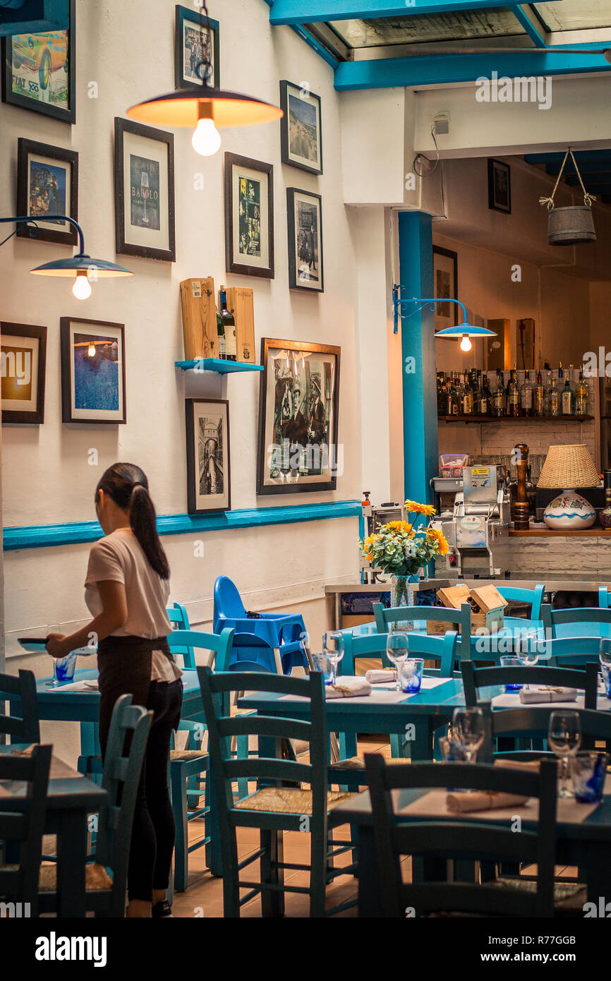 Mediterranean style restaurant with table setting and tableware Stock ...