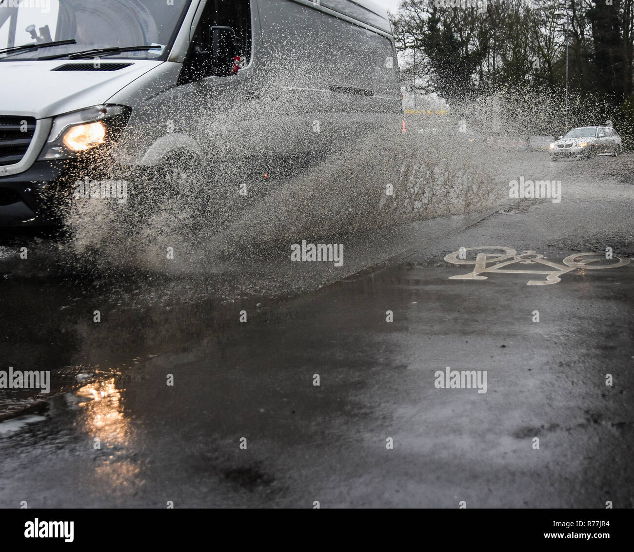 Car splashing pedestrian hi-res stock photography and images - Alamy