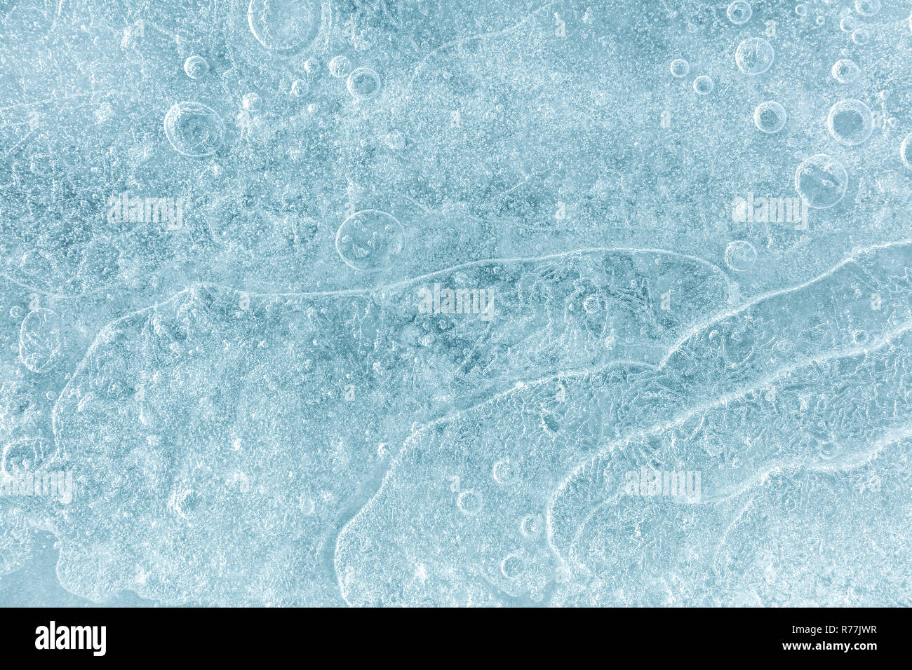 Detailed background texture of natural ice. Closeup of ice surface ...