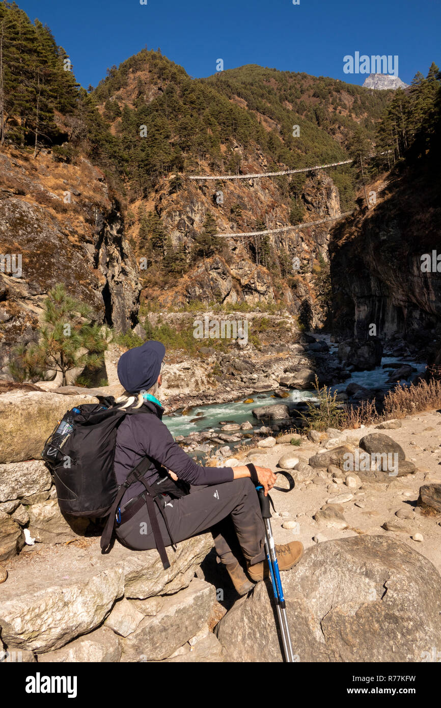 Resting on suspension bridge hi-res stock photography and images - Alamy