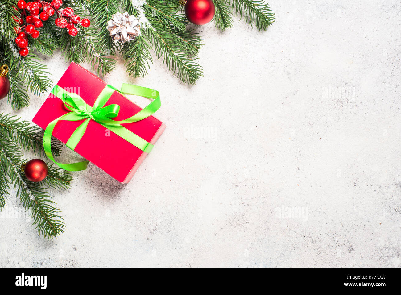 Christmas background with fir tree, present box and decorations Stock ...