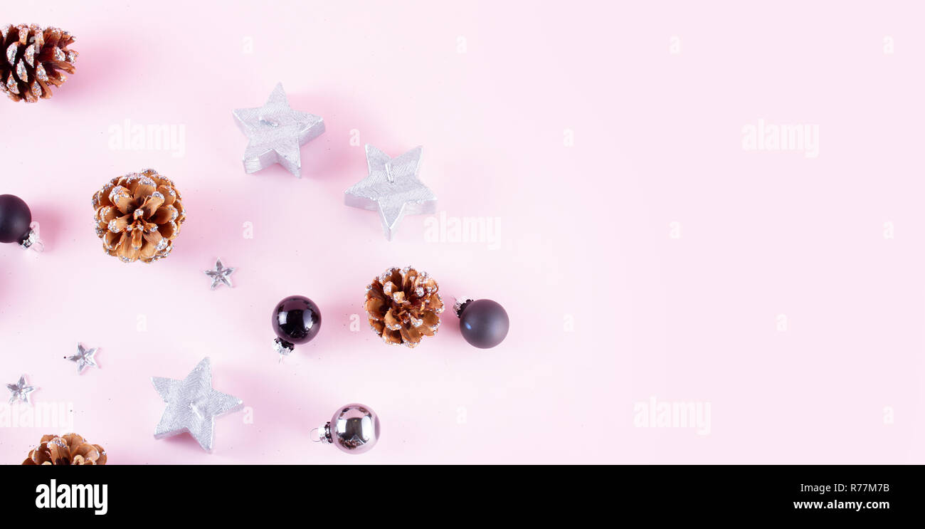 Gray Christmas decorations on pink Stock Photo - Alamy