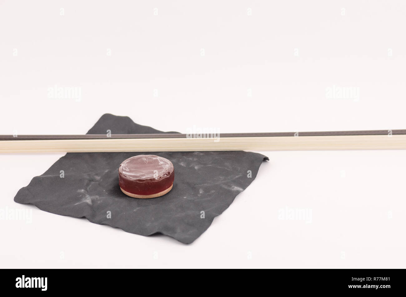 Violin rosin on black hi-res stock photography and images - Alamy