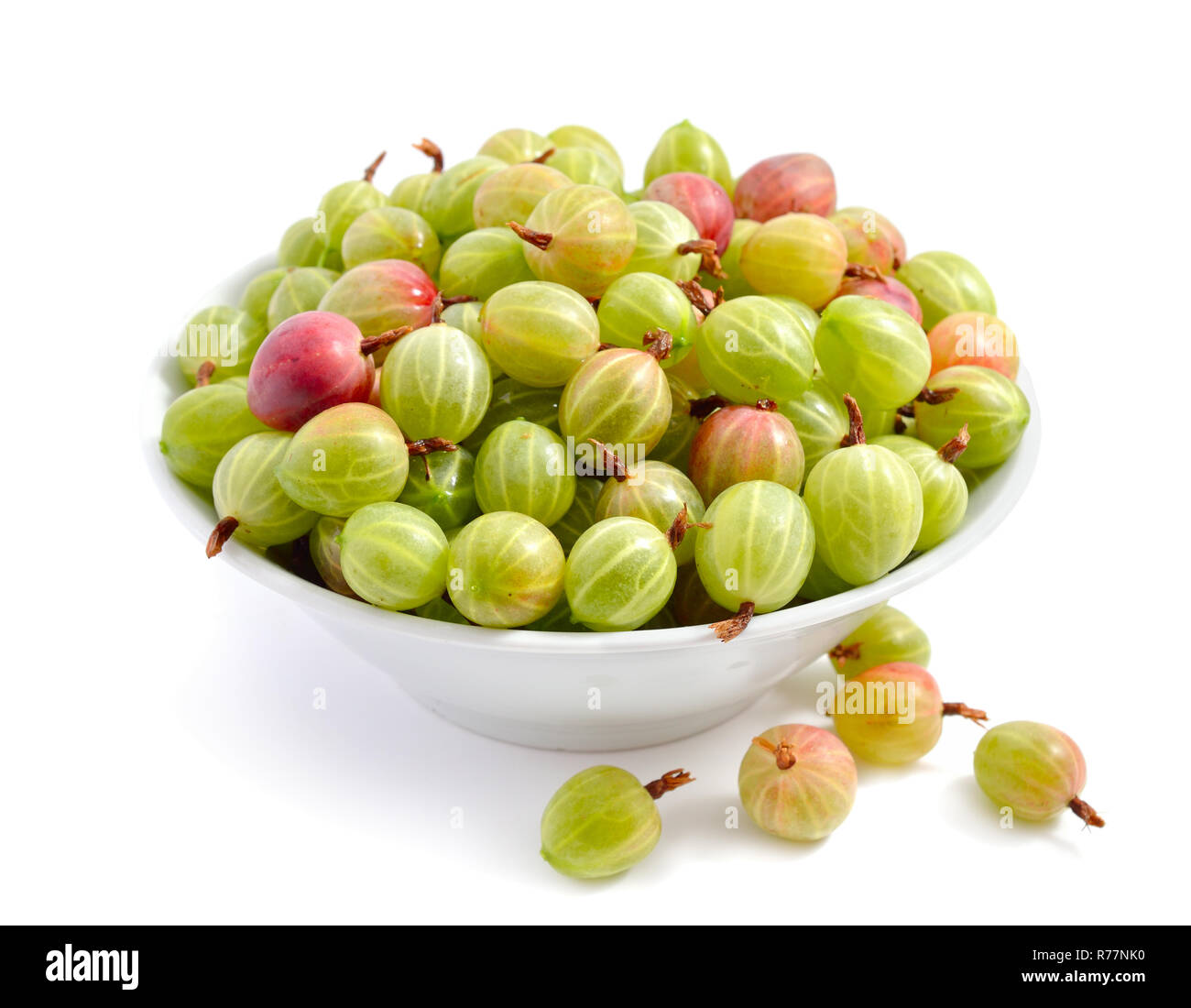 Gooseberry in a bowl. Isolated Stock Photo - Alamy