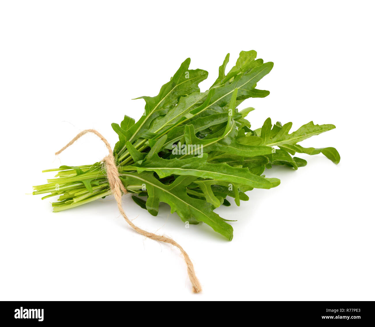 Arugula isolated on white background Stock Photo - Alamy