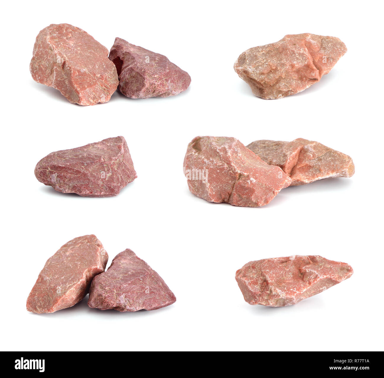 Red stones on a white background Stock Photo - Alamy