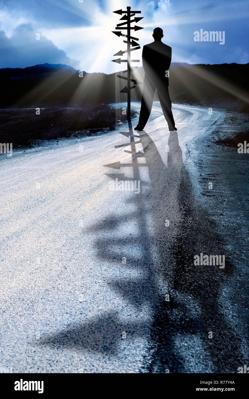 man and directional sign Stock Photo - Alamy