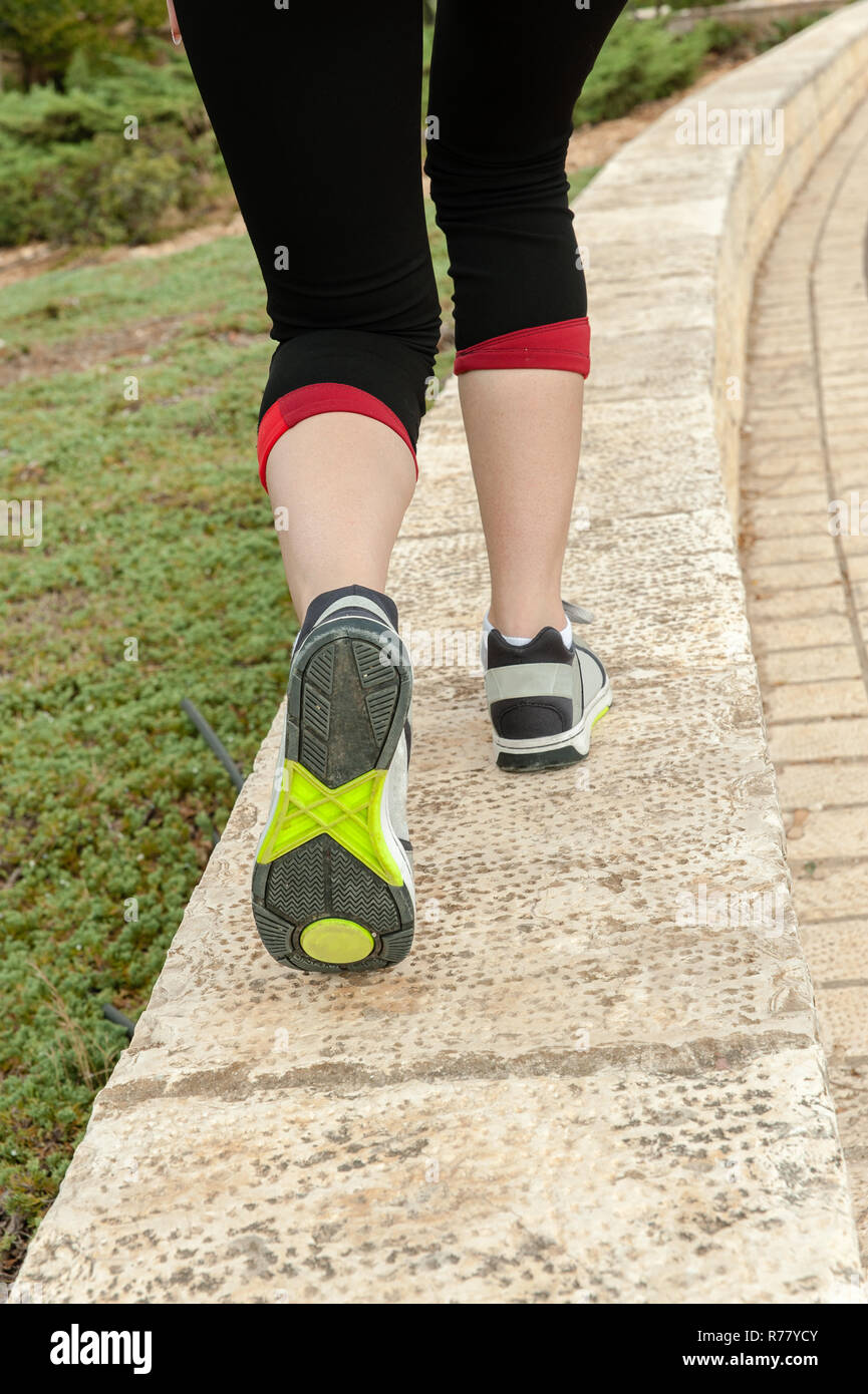 Athlete runs along running track hi-res stock photography and images ...