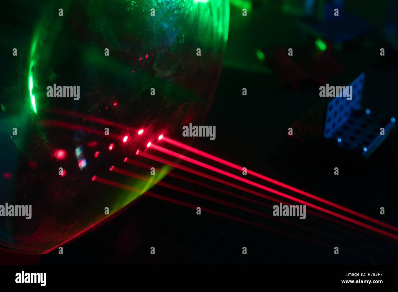 Experiment with red laser in optics lab Stock Photo - Alamy