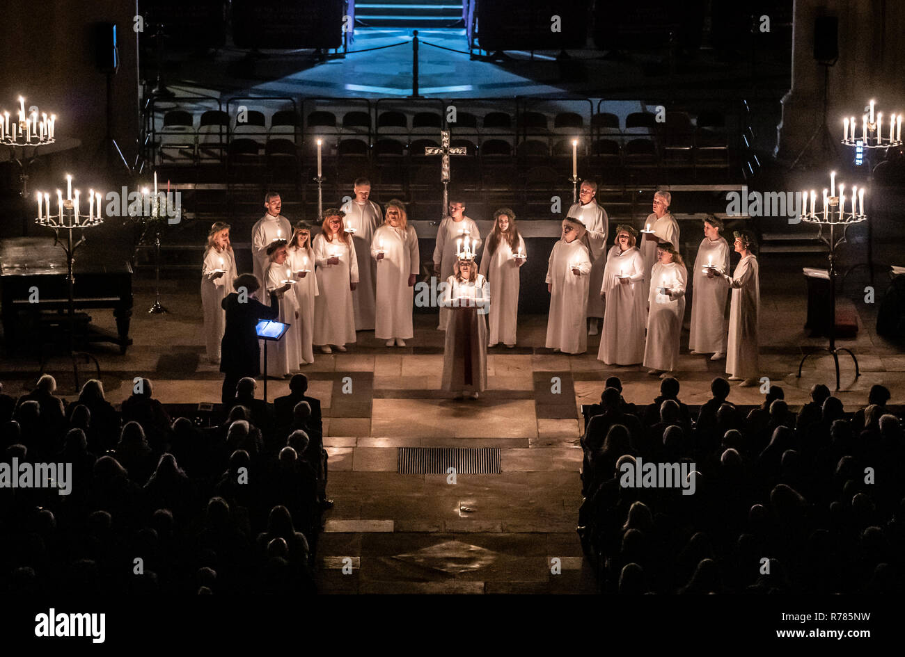 Sarah Evander, wearing a crown of candles symbolising St Lucy, leads a ...