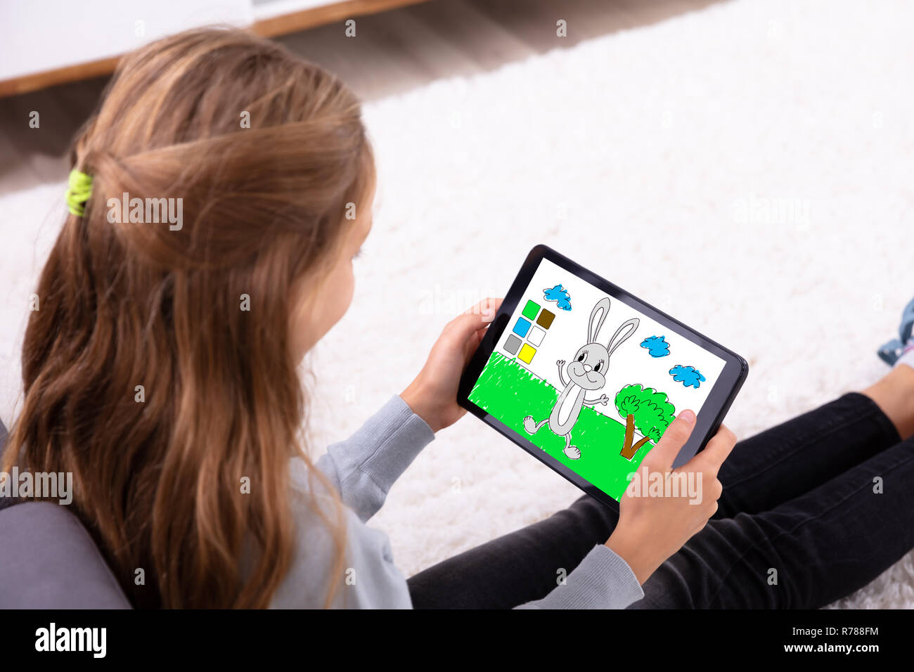 Children playing game tablet hi-res stock photography and images - Alamy