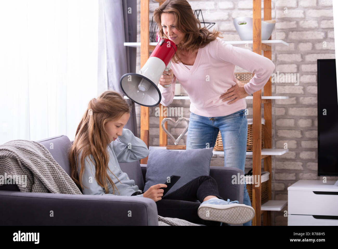 Child megaphone hi-res stock photography and images - Alamy