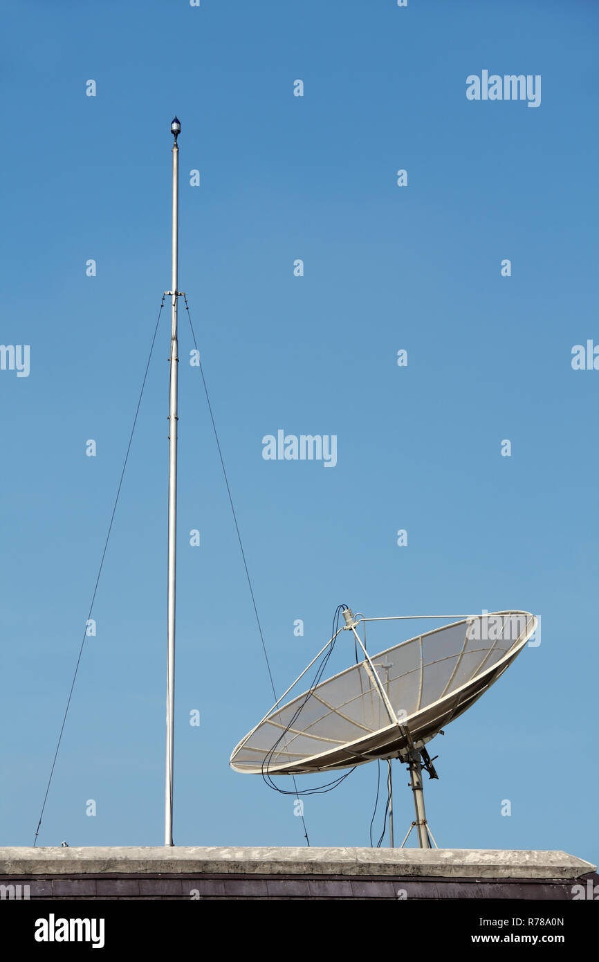 Satellite dish antenna on roof Stock Photo - Alamy