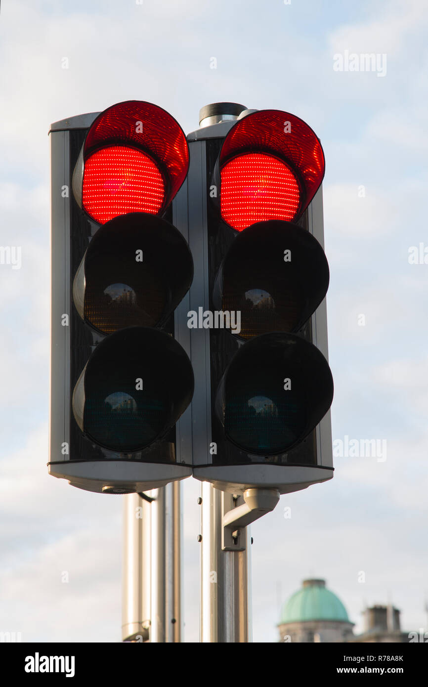 Double Red Traffic Light in Urban Setting Stock Photo - Alamy