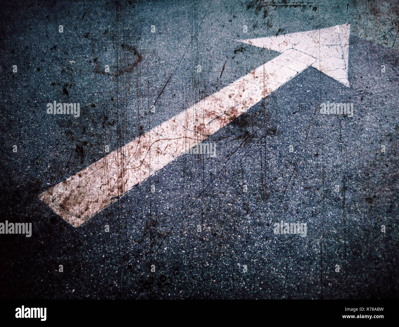 an arrow on the road Stock Photo - Alamy