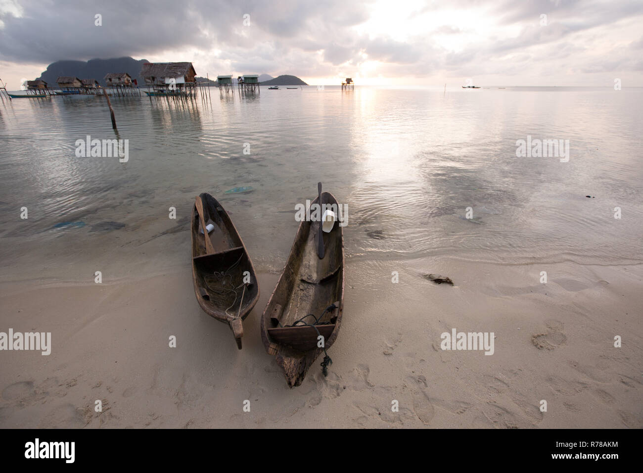 Sea gypsies water village and small boat in the Maiga Island,Semporna ...