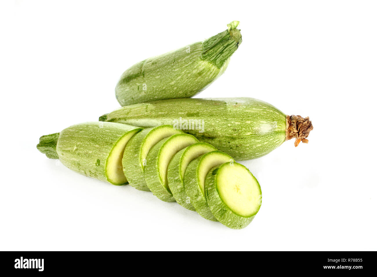 zucchini isolated over white Stock Photo - Alamy