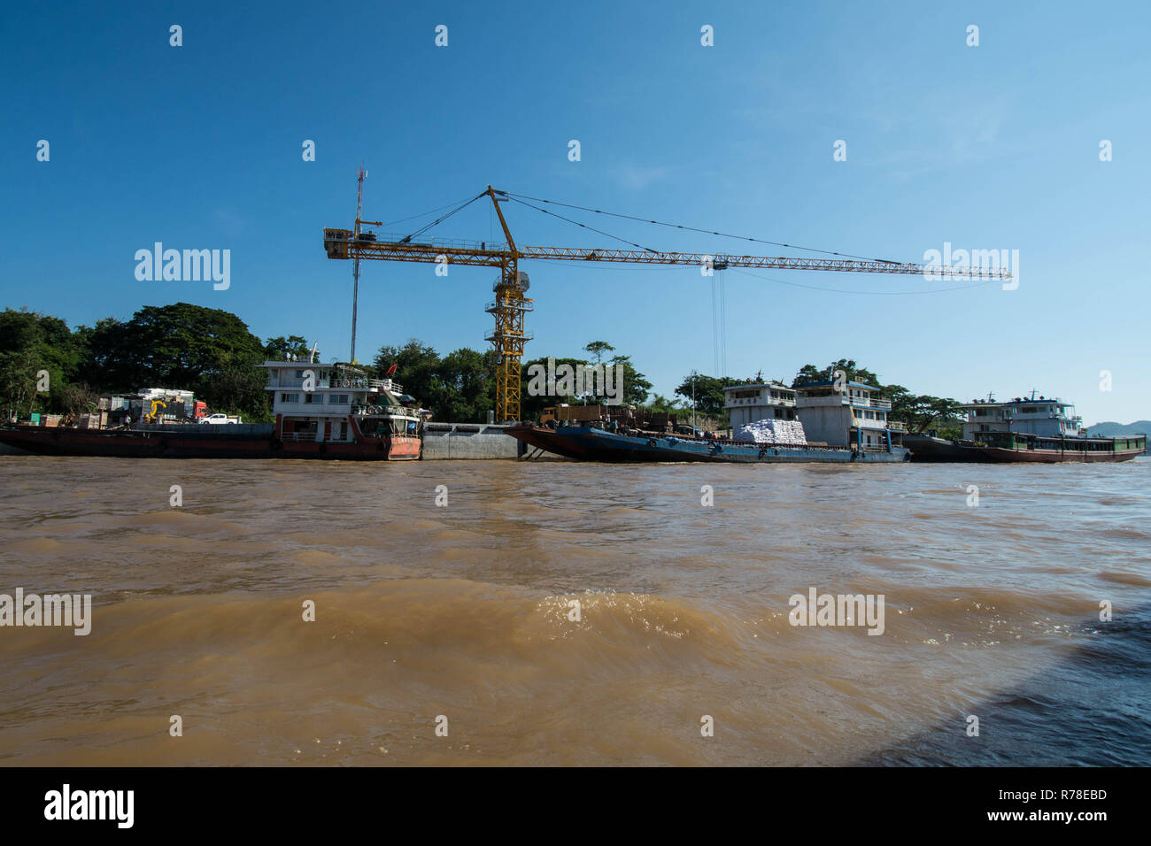 Thailand crane and boats on the river Myanmar boat houseboat houseboats ...
