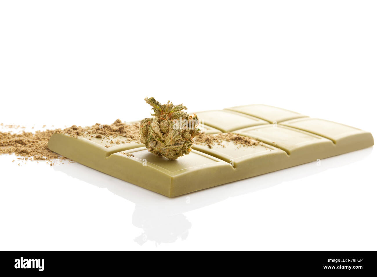 Green cannabis chocolate block with marijuana bud Stock Photo - Alamy