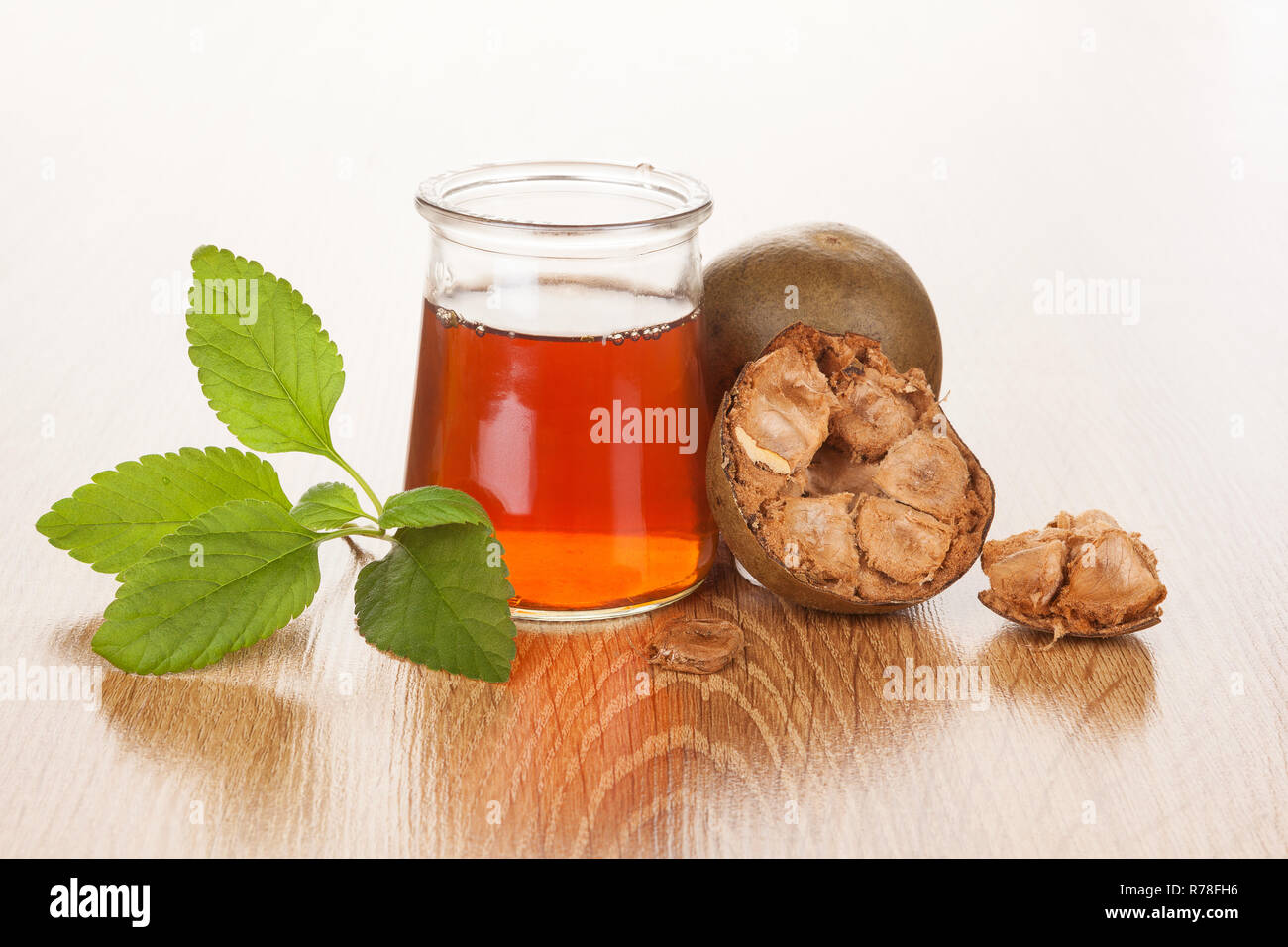 Monk tea on wooden background Stock Photo - Alamy