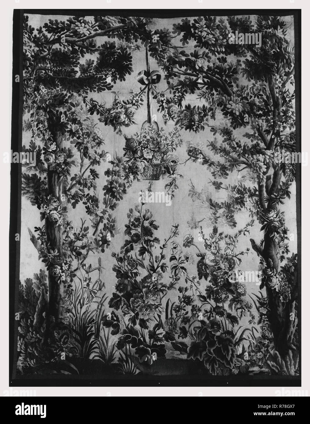 Garlanded trees and wild flowering plants framing ribbon-suspended ...