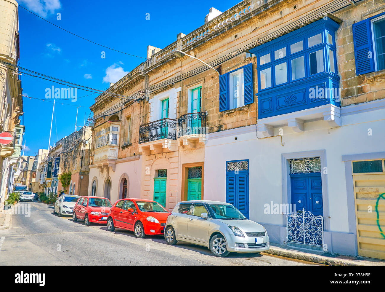 The Santa Lucija street in old residential district with low medieval ...