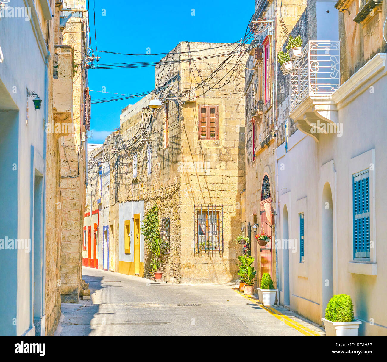 The cozy street of small town in heart of Malta island with beautiful ...