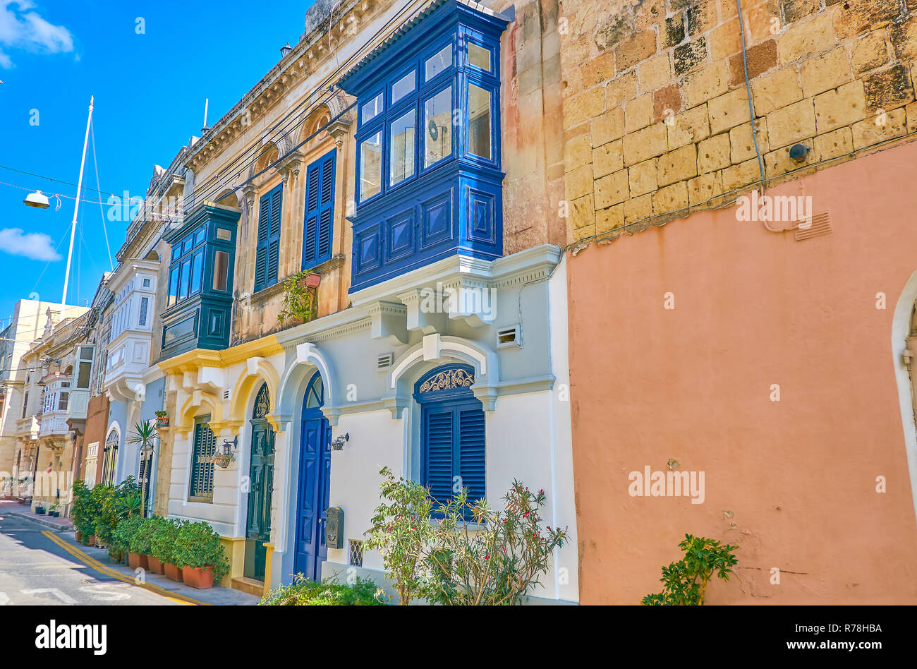 The historical houses with Maltese balconies and beautiful frontages ...