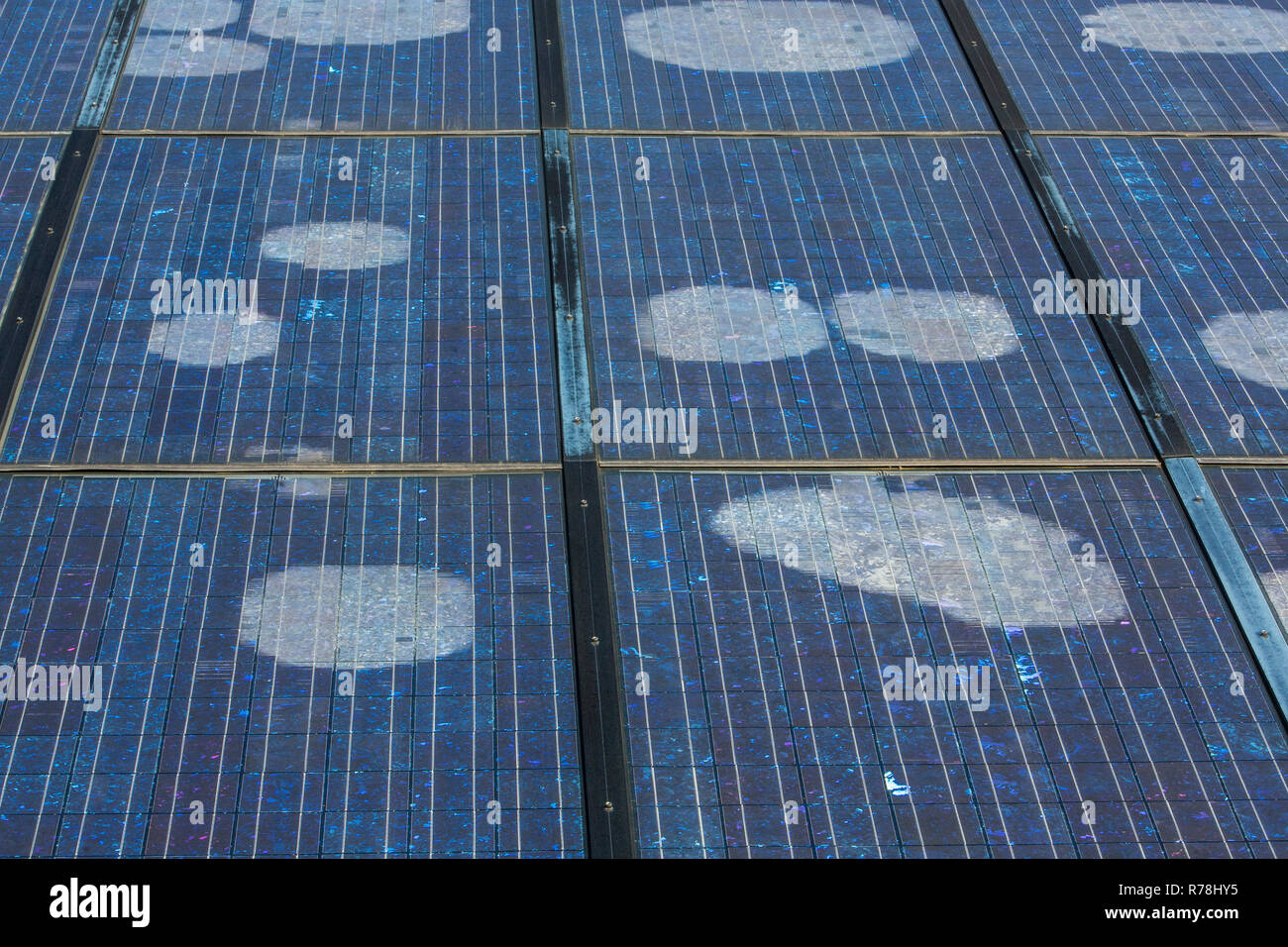 Solar panels with spots Stock Photo - Alamy