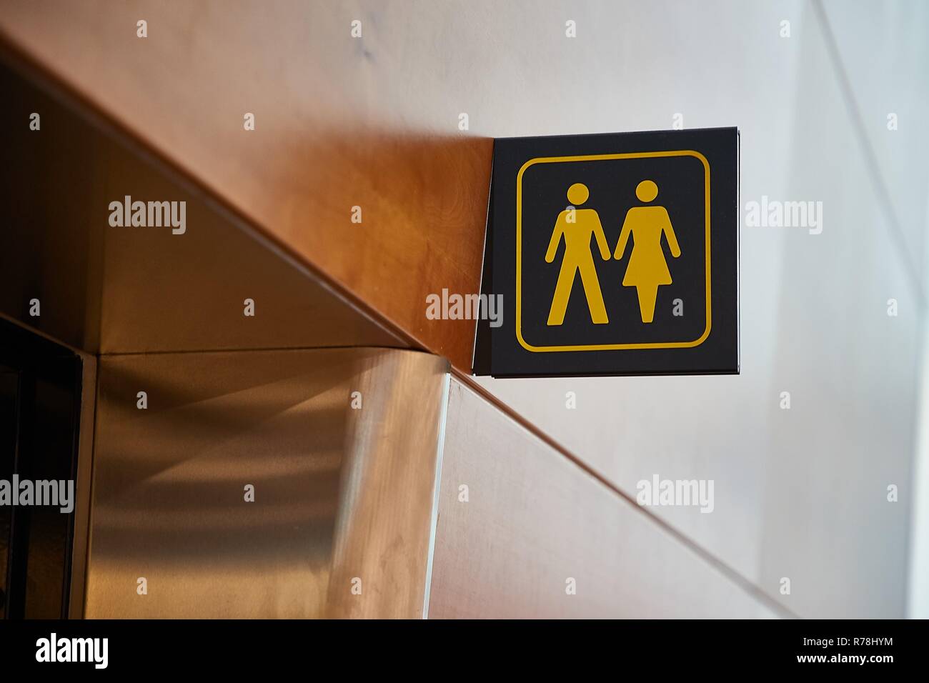 Toilet sign in a building Stock Photo - Alamy