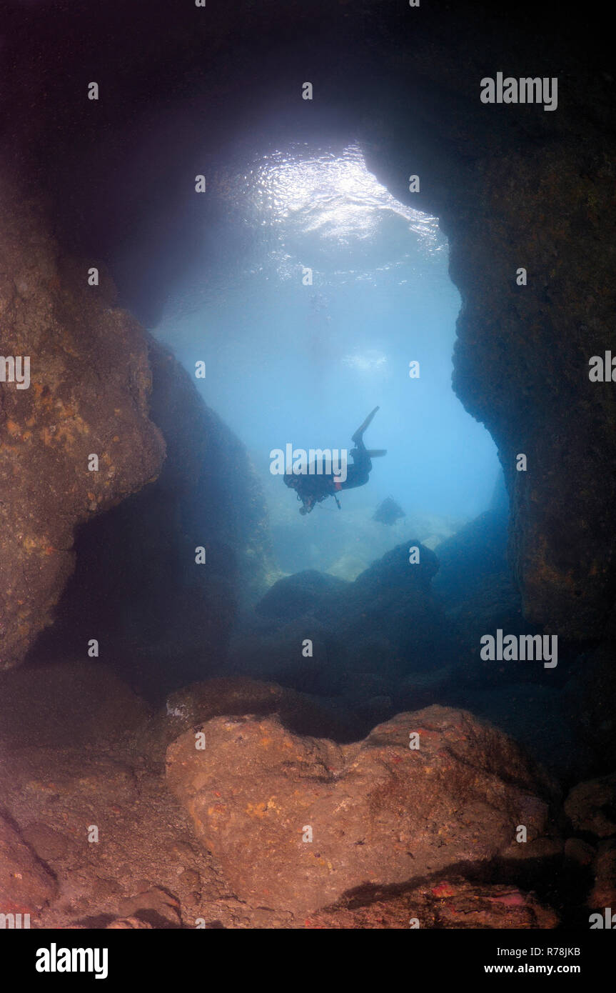 Diver looking into a cave, Bohol Sea, Cebu, Philippines Stock Photo - Alamy