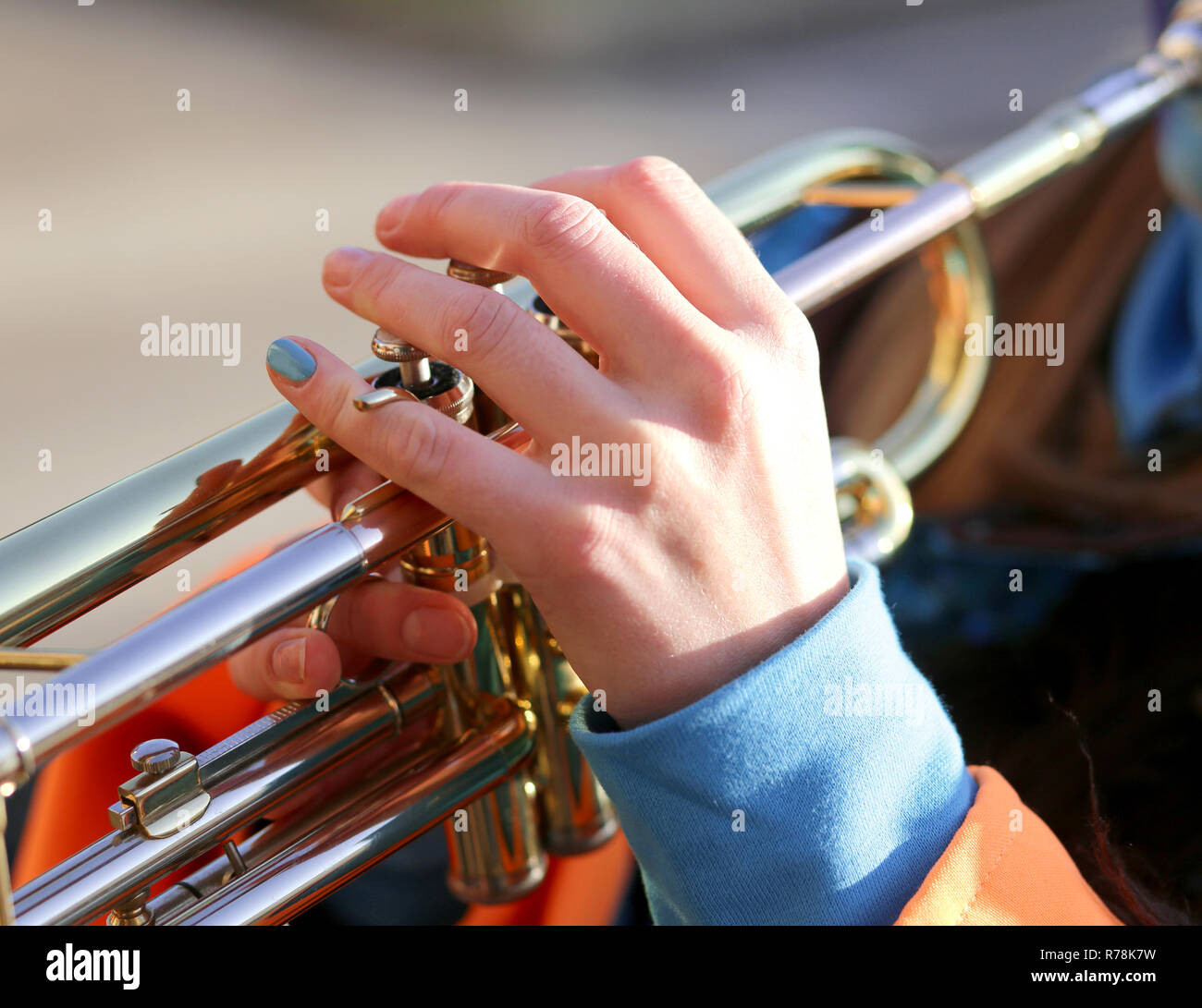 hand of woman playing the trumpet in the music band d Stock Photo - Alamy