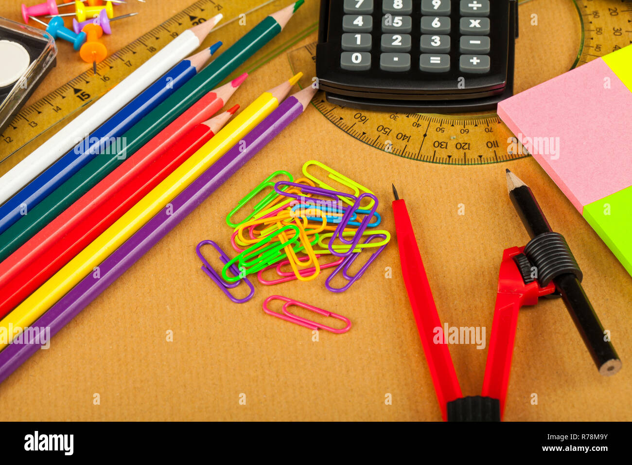 School learning tools - notebook, pen, scissors, calculator, ruler, etc ...