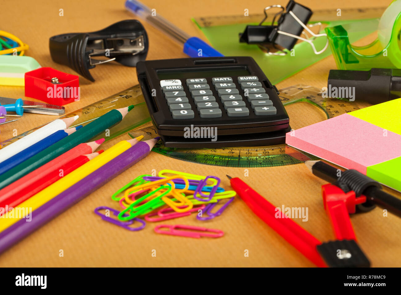 School learning tools - notebook, pen, scissors, calculator, ruler, etc ...