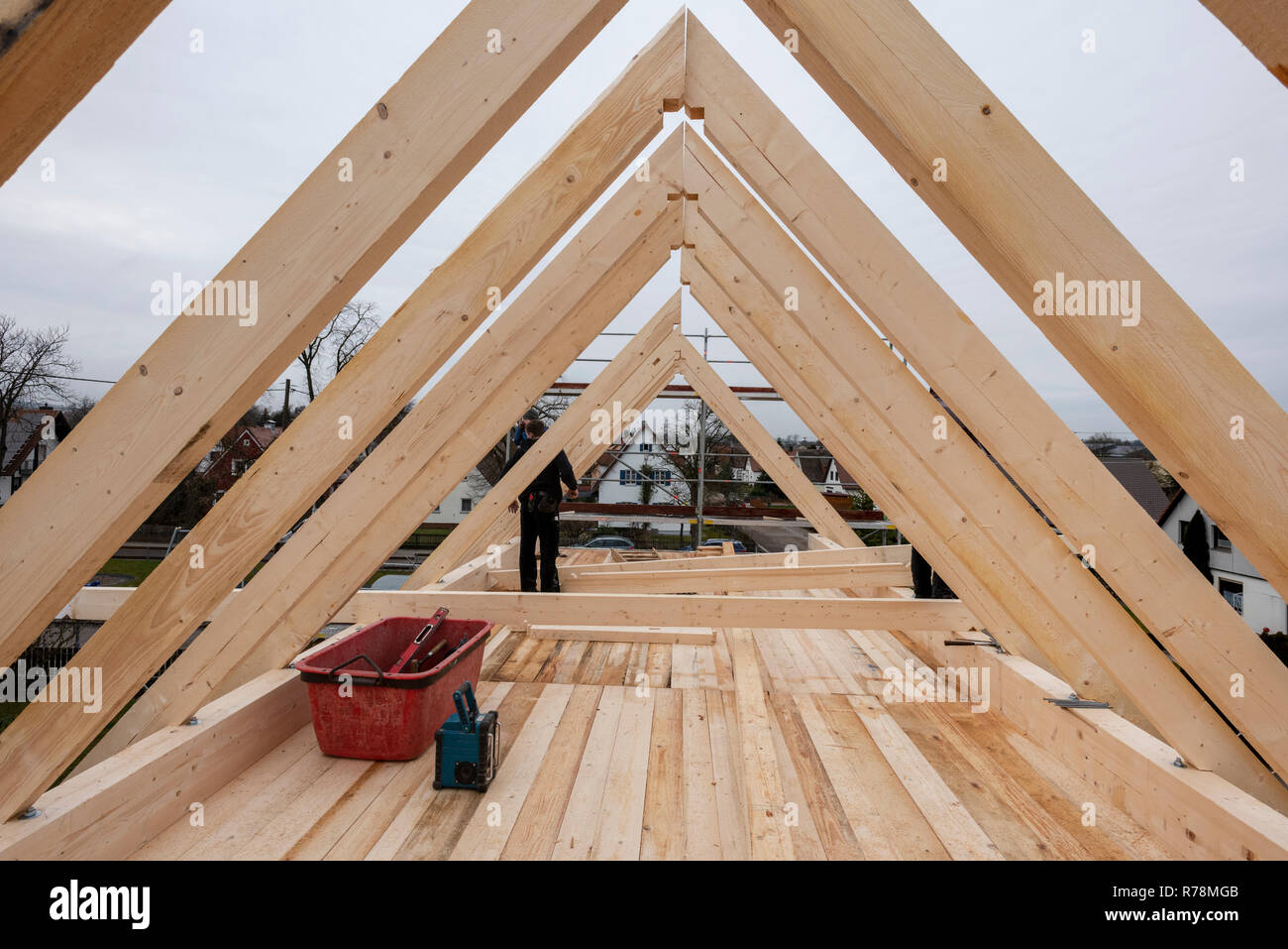 new house in construction with wooden roof Stock Photo - Alamy