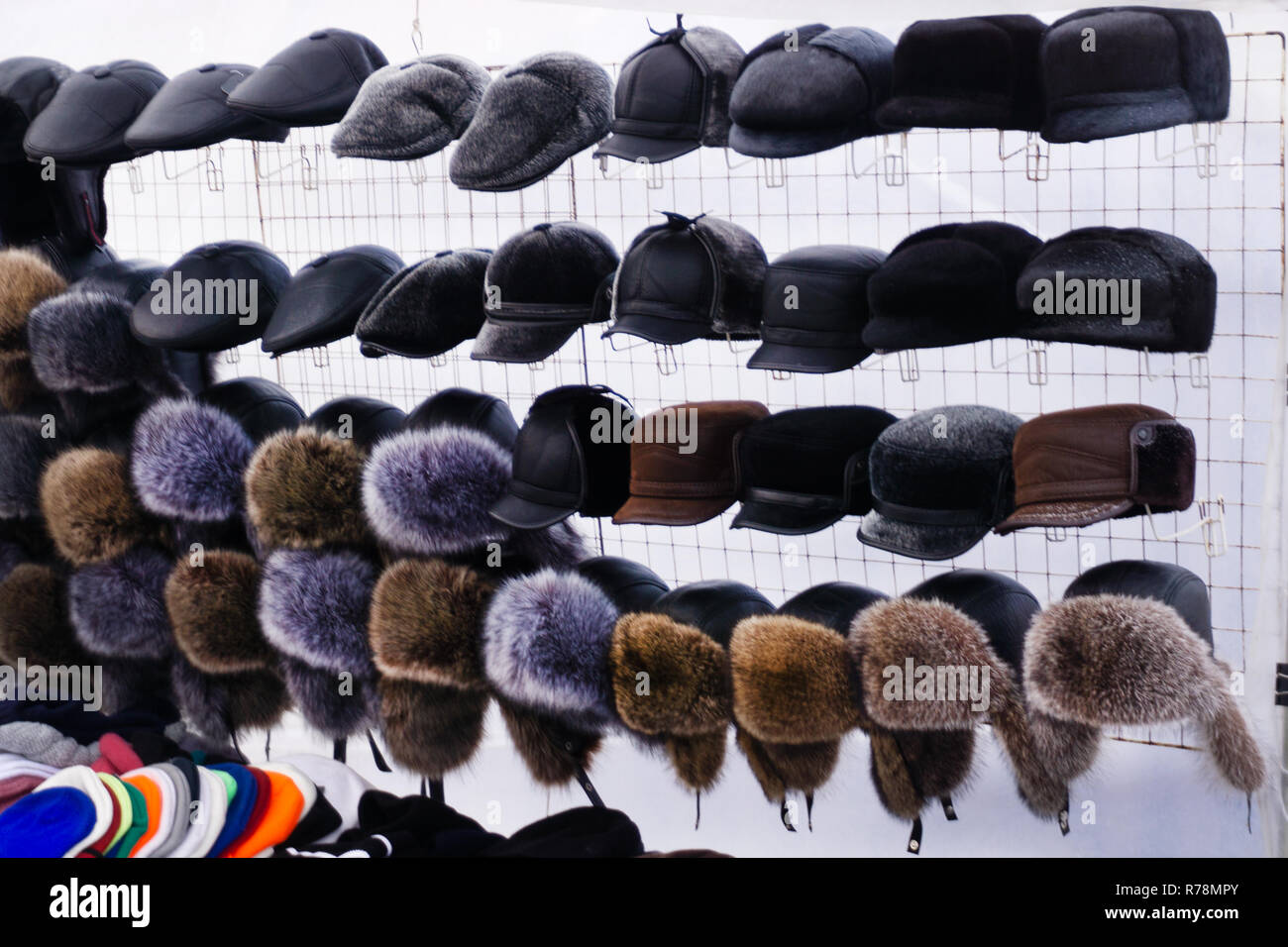 set of winter hats with pompon isolated on white Stock Photo - Alamy