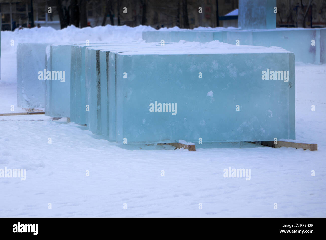 Big block of ice in evening sunlight Stock Photo - Alamy