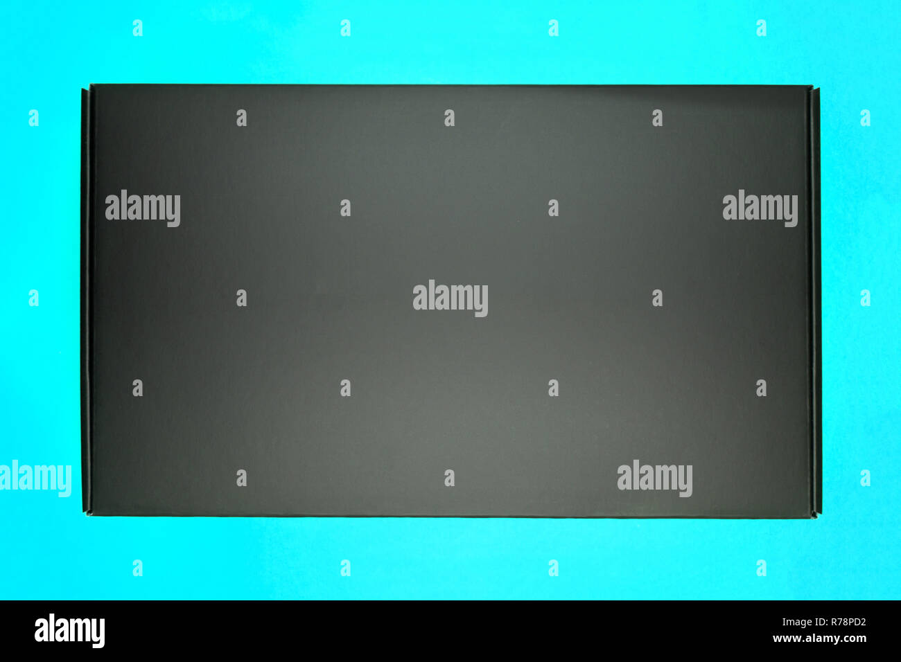 black boxs and pen on blue paper in strip Stock Photo - Alamy