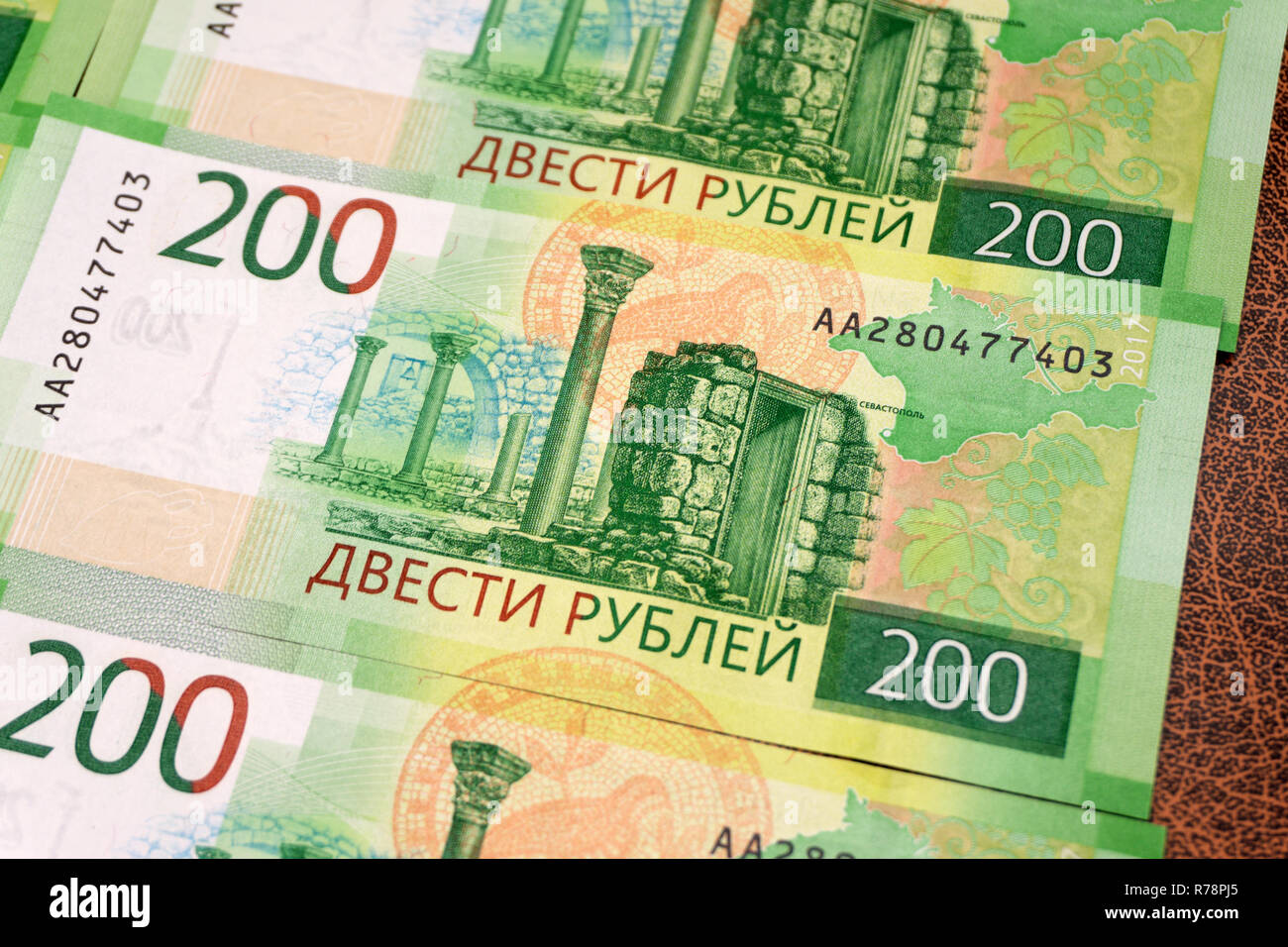 Set of new russian banknotes on white background. 200 rubles ...