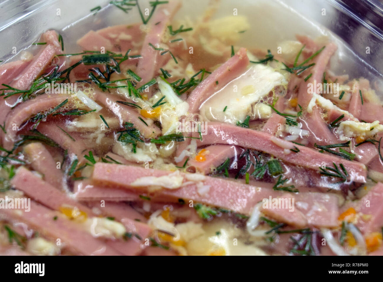 Traditional Russian food. Aspic chicken jelly with dill Stock Photo - Alamy