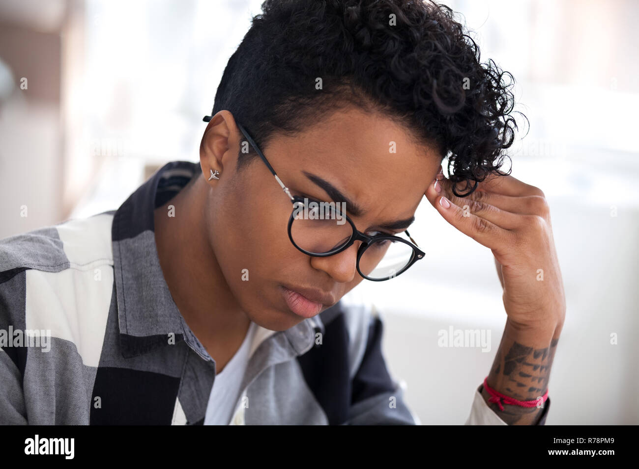 Close up of thoughtful black girl making decision Stock Photo - Alamy