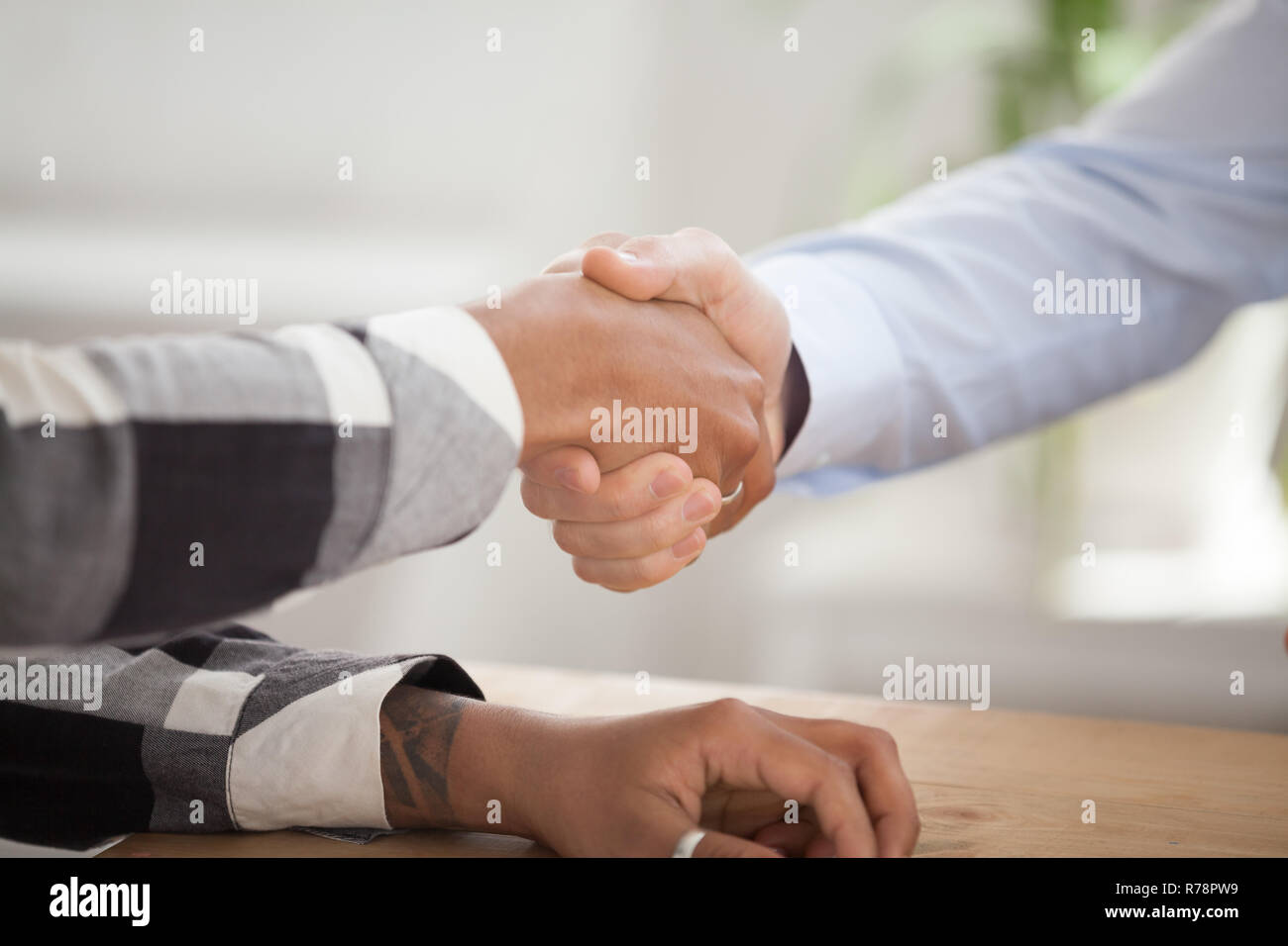 Black boss handshake congratulating hi-res stock photography and images ...