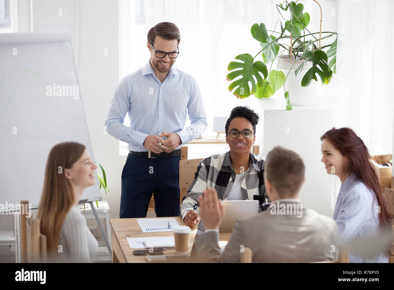 Team laugh hi-res stock photography and images - Alamy